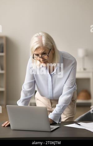 Old employee working from home during pandemic Stock Photo - Alamy