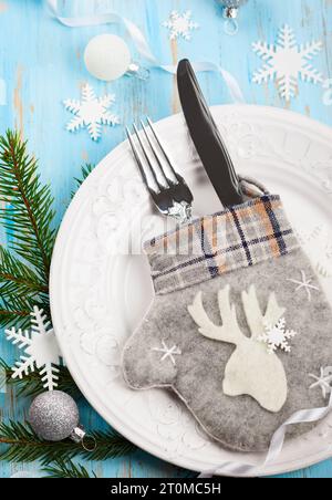 Rustic table setting for festive Christmas dinner with vintage decor on ...