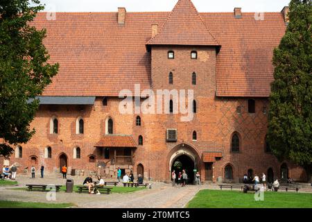 The Malbork Middle Castle courtyard and tourists, Malbork, Poland ...