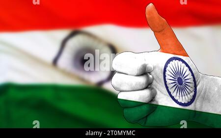 thumbs up in approval with the Indian flag painted Stock Photo - Alamy