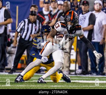 Oregon State wide receiver Jesiah Irish (13) is tackled by Notre Dame ...