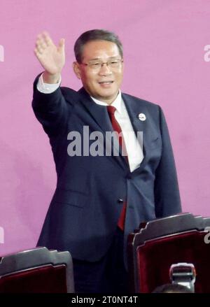 Chinese Premier Li Qiang waves as he attends the closing ceremony of ...