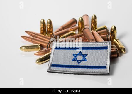 Israel flag with weapon ammunition. War between Israel and Palestine ...