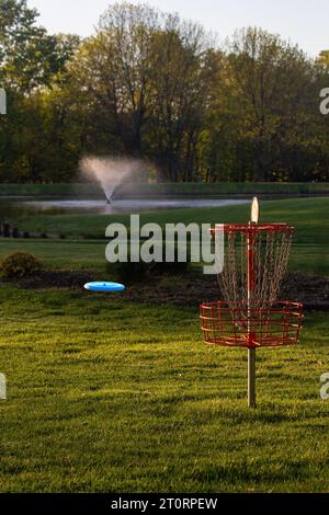 disc golf course with water fountain Stock Photo - Alamy