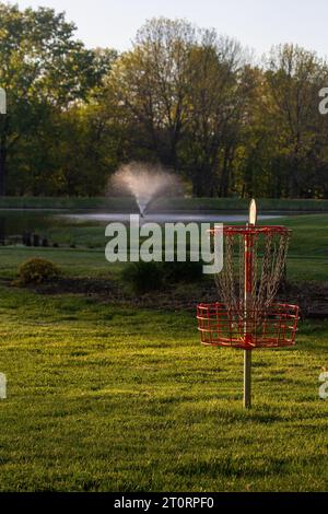 disc golf course with water fountain Stock Photo - Alamy