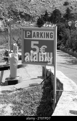 Parking sign informing drivers of 5€ fee for all day parking at St Paul ...