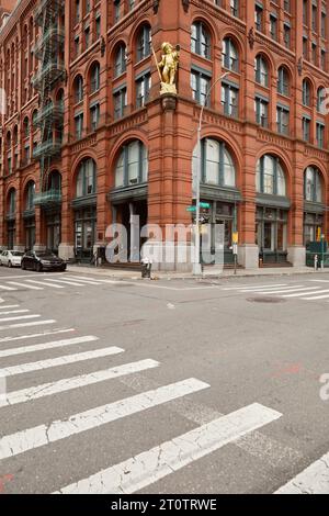 famous puck building near pedestrian crossing in manhattan district ...