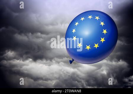 FOTOMONTAGE, EU-Ballon vor dunklen Wolken im Regen, Symbolfoto EU ...