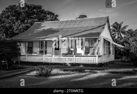 Caribbean-style house with a corrugated tin roof and a veranda in ...