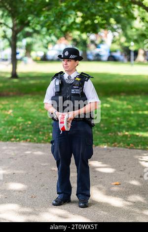 Metropolitan Police WPC woman officer in a Police station custody suite ...