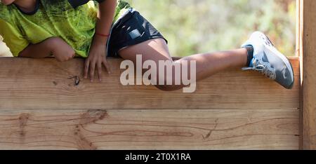 Running over obstacles kids race participant, extreme sport Stock Photo ...