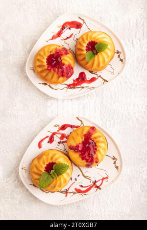 Semolina cheesecake with strawberry jam, lavender, cup of coffee on ...