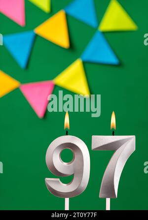 Birthday card with green number 97 candle - Pastel pink background ...