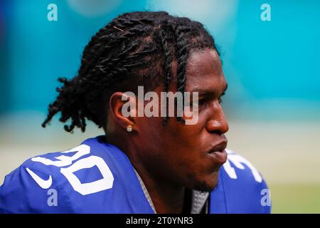 New York Giants cornerback Darnay Holmes (30) runs towards the ball ...