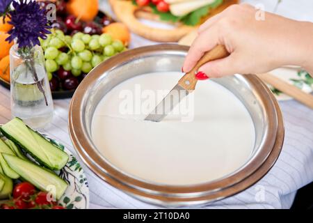 Master class and cheese tasting. Women make cheese. The enzyme and ...
