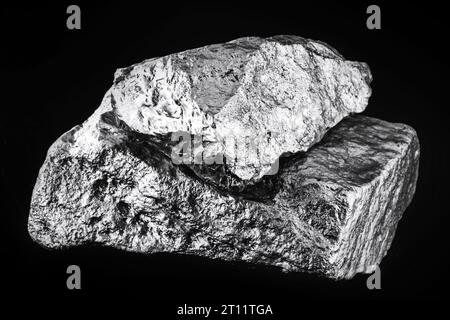 small titanium stone, metal used in light alloys. Macro photography of ...