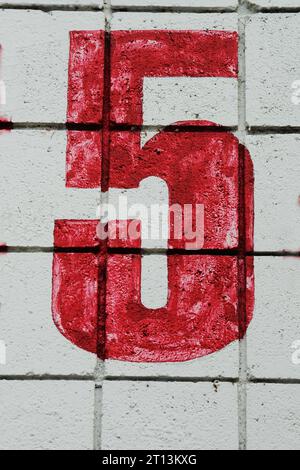 Faded number 4 showing all its character of age, wear & usefulness ...