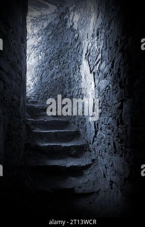 Stone steps in underground castte. monochrome image Stock Photo - Alamy