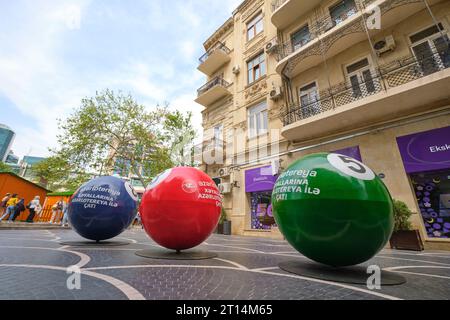 A view of giant pool, billiard, numbered, colored balls, promoting the ...