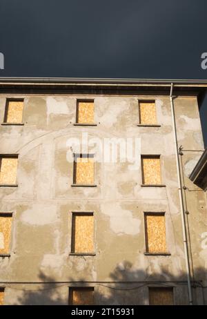 Old condemned building with boarded windows in the Lower East Side ...