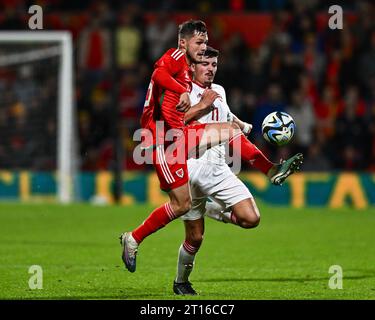 Liam Cullen of Wales controls the ball during the International ...