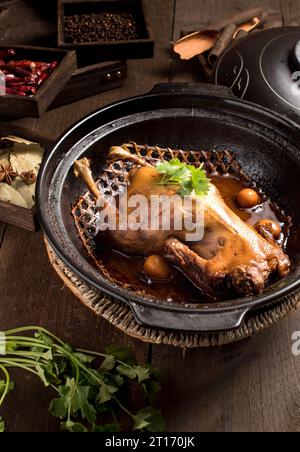 Delicious ginger duck stew hot pot soup with fresh vegetables in Taiwan ...