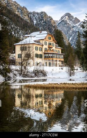 Lake Dobbiaco. Treasure chest among the Dolomites. Winter atmosphere ...