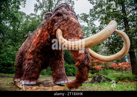 A view of a huge mammoth completely assembled under heavy rain. This ...