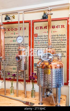 Micro distillery making gin set against a decalogue showing the ten ...
