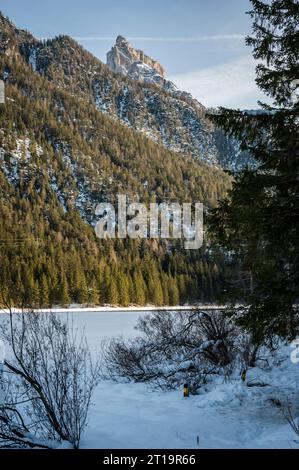 Lake Dobbiaco. Treasure chest among the Dolomites. Winter atmosphere ...