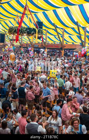 Beer tent full of drunken people, Canstatter Wasen, Stuttgart, Germany ...