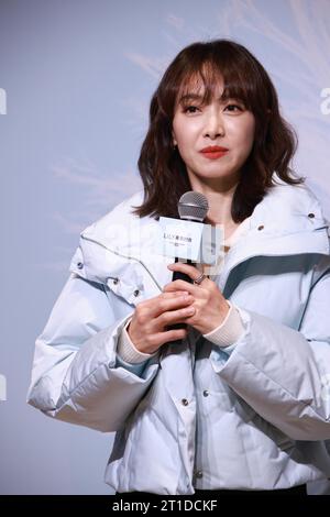 Chinese singer, dancer, actress, model, television presenter and author ...