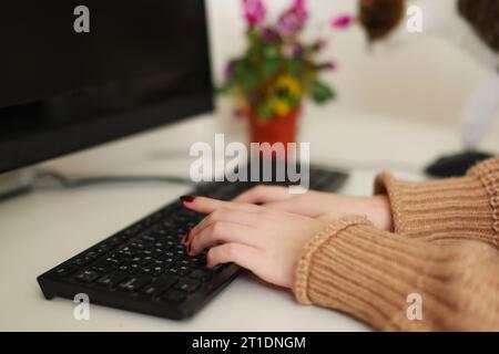 Hands of office manager over keypad in corporate workplace. Close up of ...