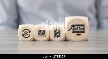 Wooden blocks with symbol of software testing concept on blue ...