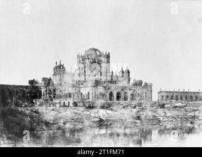 The Indian Mutiny 1857-1859 Aftermath of the Siege of Lucknow. The damaged gate of the Small ...