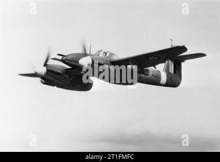 Whirlwind Mark I, P6997, in flight, loaded with two 500-lb GP bombs on ...