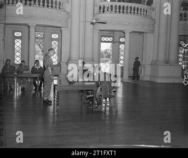 Major General Ichada signs the Japanese surrender document at Rangoon ...
