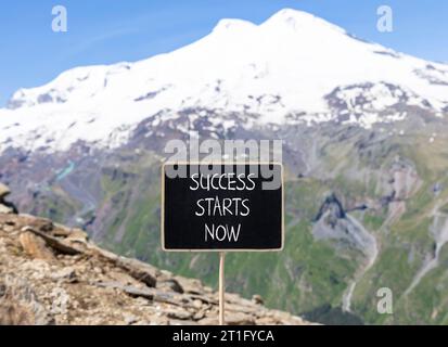 Success starts now symbol. Concept word Success starts now on beautiful ...