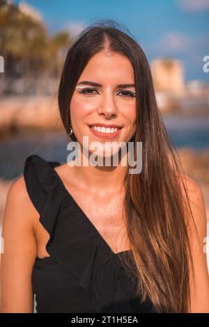 Beautiful adult woman enjoy sea on sunny day Stock Photo - Alamy