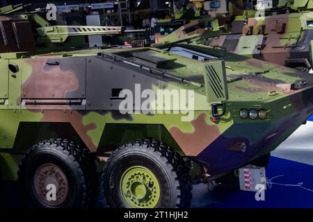 Armored combat vehicle painted in camouflage colors, armed with lethal ...