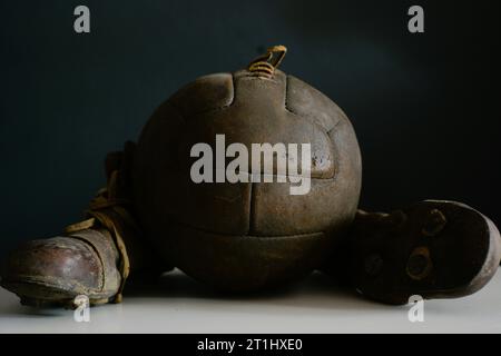 Old Football Boots and ball 1930 / Cristi Stavri Stock Photo - Alamy