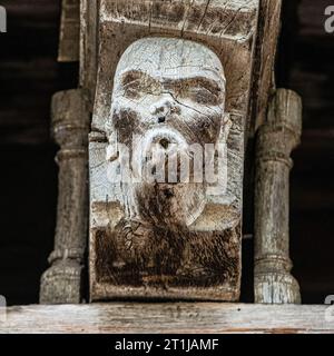 A medieval carved wooden beam in the town of Mirepoix, Aude Stock Photo ...