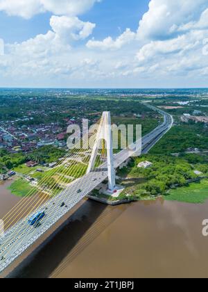 Aerial view of Siak Bridge IV (Abdul Jalil Alamuddin Syah Bridge) above ...