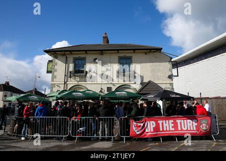 Wrexham fans enjoy a drink at The Turf near the ground ahead of the ...