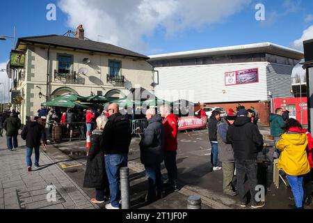 Wrexham fans enjoy a drink at The Turf near the ground ahead of the ...