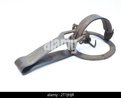 Old rusted metal trap for catching small wild animals Stock Photo - Alamy