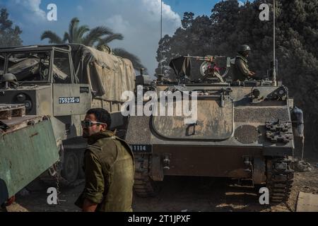 14 October 2023, Israel, Be·eri: An Israeli soldier patrols the area in ...