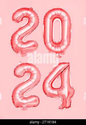 Pink foil balloons with the number 2024 Stock Photo - Alamy
