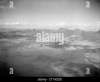 HMS Mauritius, a Fiji Class Cruiser at Sea. August 1942. An aeriel view ...