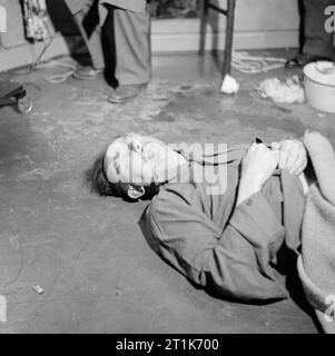 The body of SS Reichsfuehrer Heinrich Himmler lies on the floor of an ...